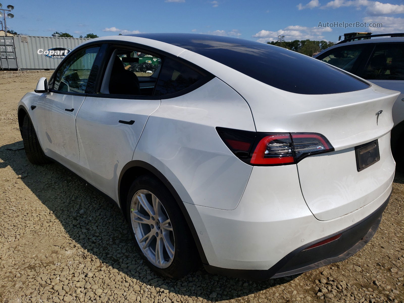 Price & History 2021 Tesla Model Y vin: 5YJYGDED3MF105575 | AutoHelperBot