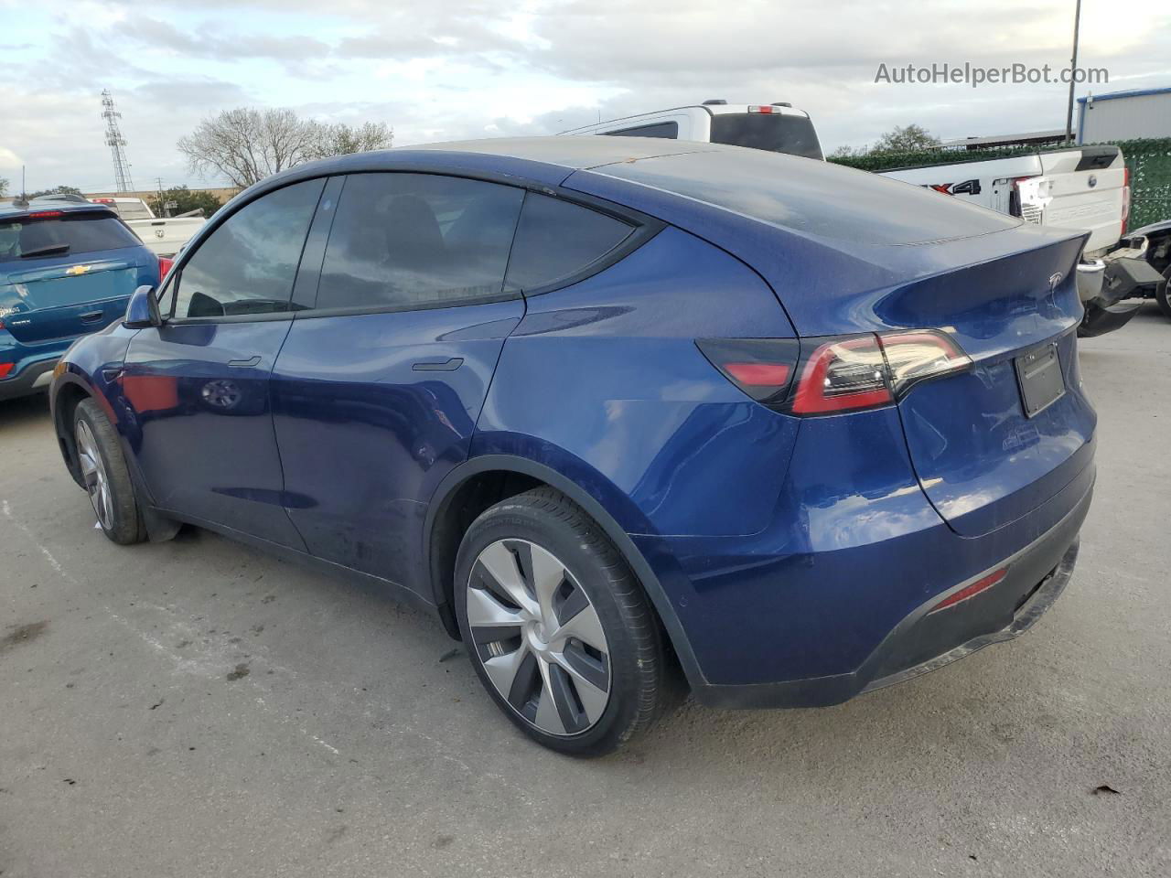 Price & History 2021 Tesla Model Y vin: 5YJYGDEE9MF232887 | AutoHelperBot